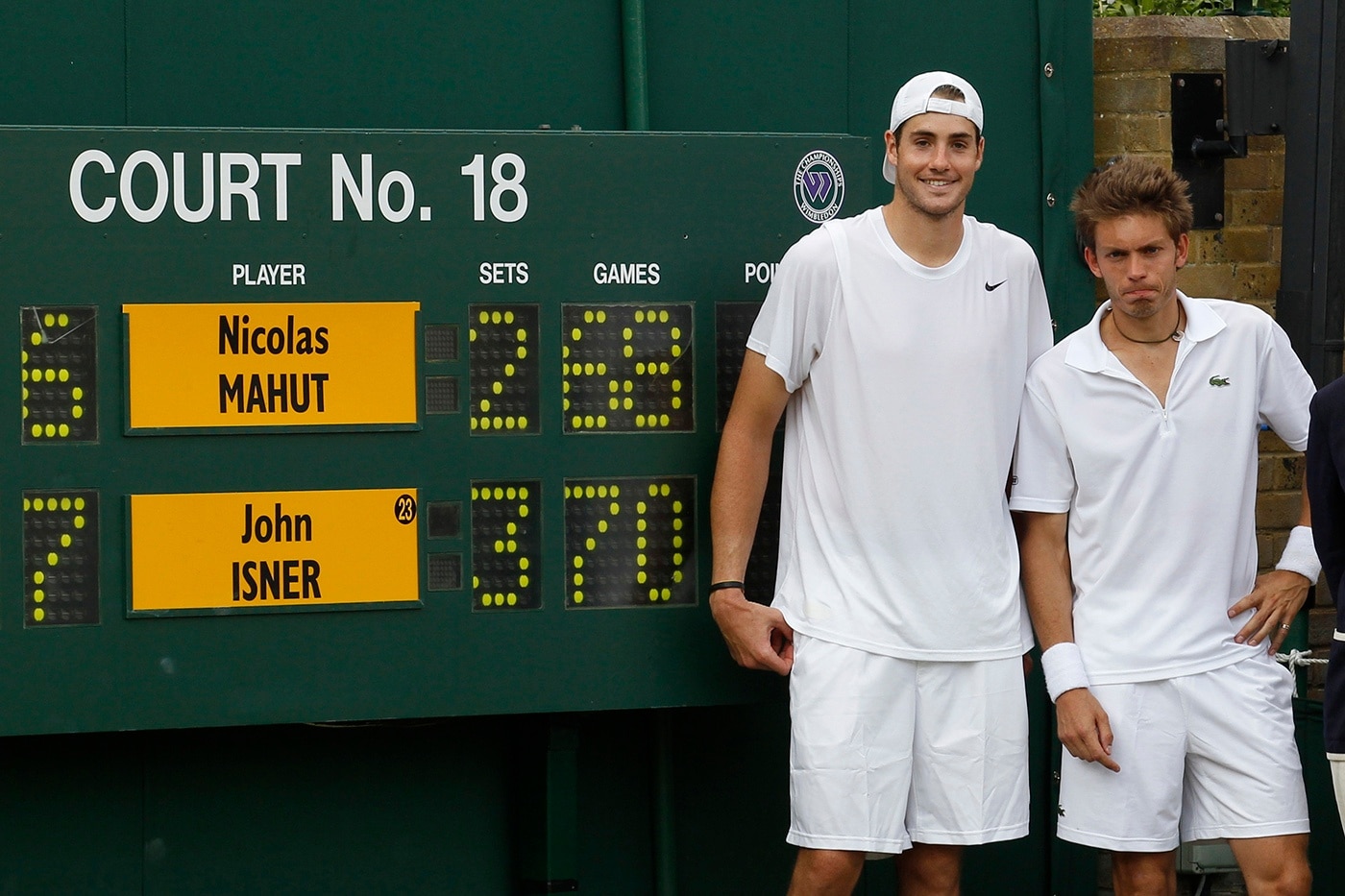 John Isner and Nicolas Mahut - The Championships, Wimbledon - Official ...