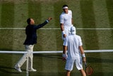 Coin toss, Milos Raonic, John Isner - The Championships, Wimbledon ...